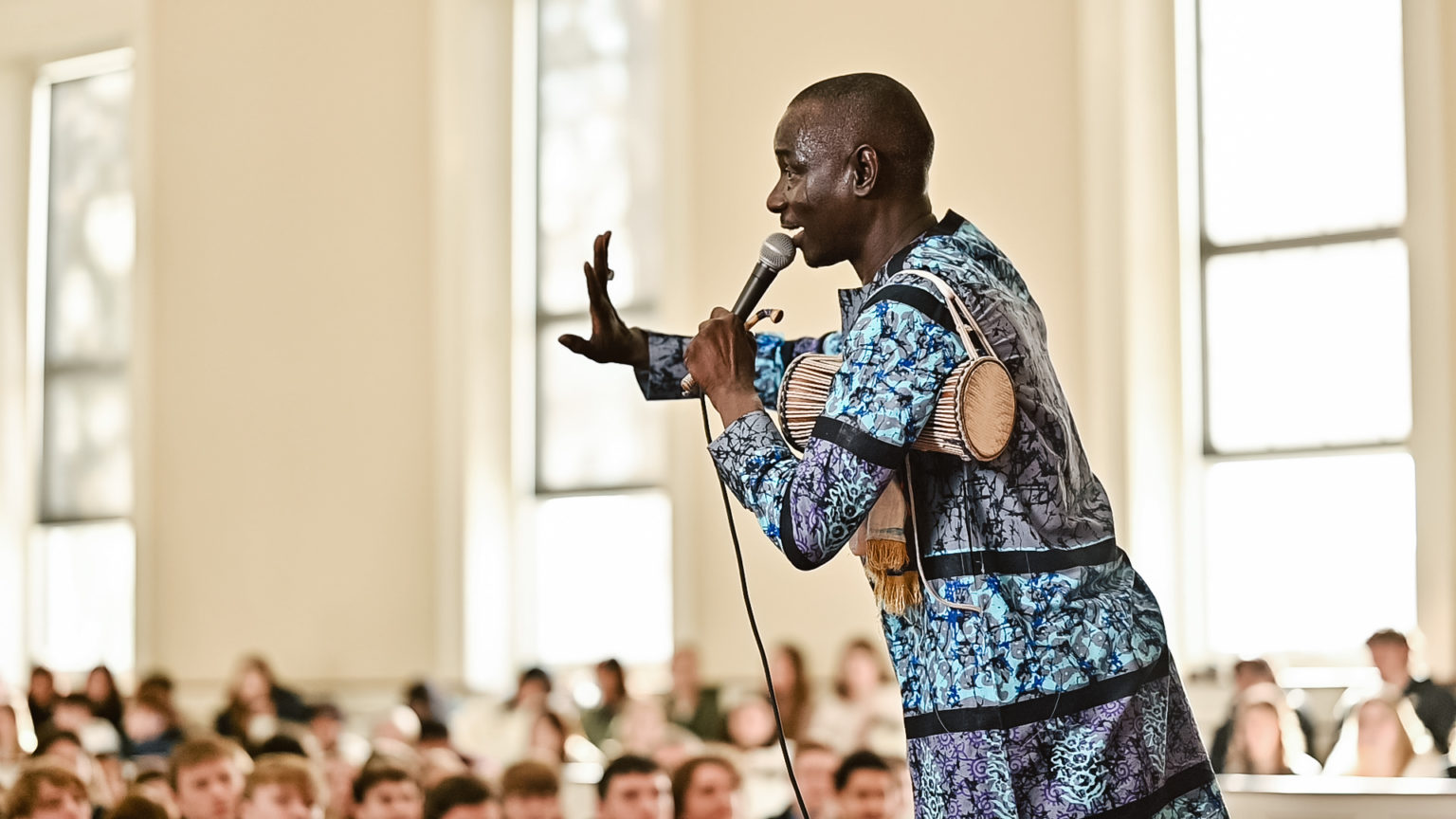 Massamba Diop and his tama bring school together during Martin Luther King Jr. Day Assembly ...